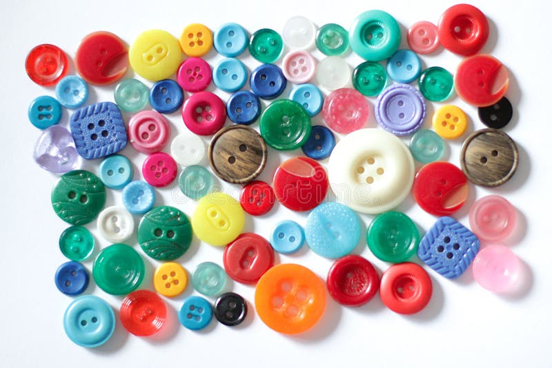 Many Buttons of Different Colors and Sizes on a White Background ...