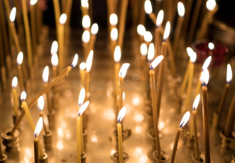 Many candles glowing. stock image. Image of attacks - 115874877