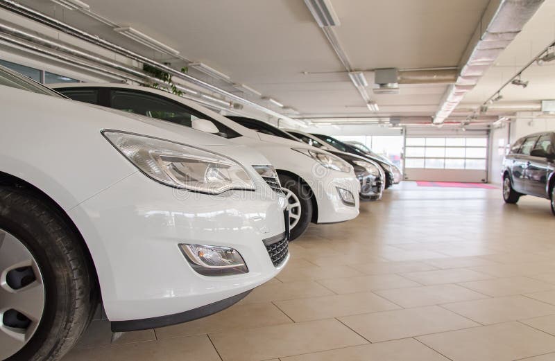 Many cars in parking lot stock photo. Image of dealership - 40202956