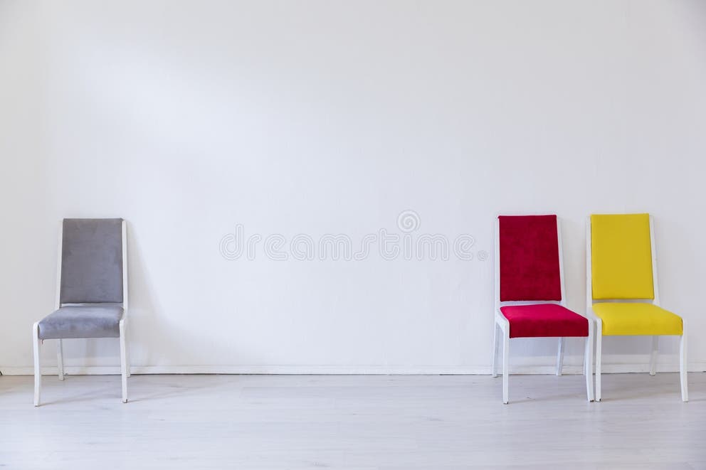 Many Chairs of Different Colors in the Interior of an Empty White Office Room Stock Photo ...