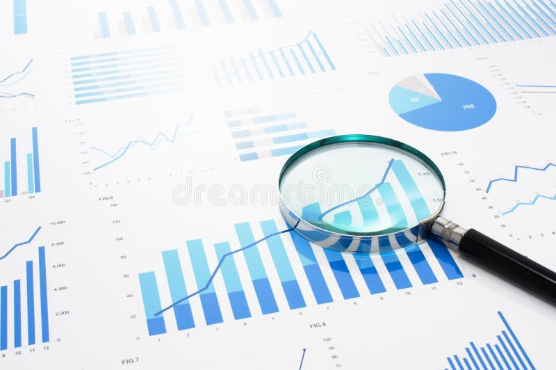 Many Charts and Magnifying Glass. Reviewing Data. Stock Image - Image ...