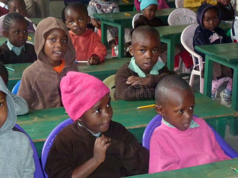 Many Children of African Ethnic Origin Sit at Desks and Study in the ...