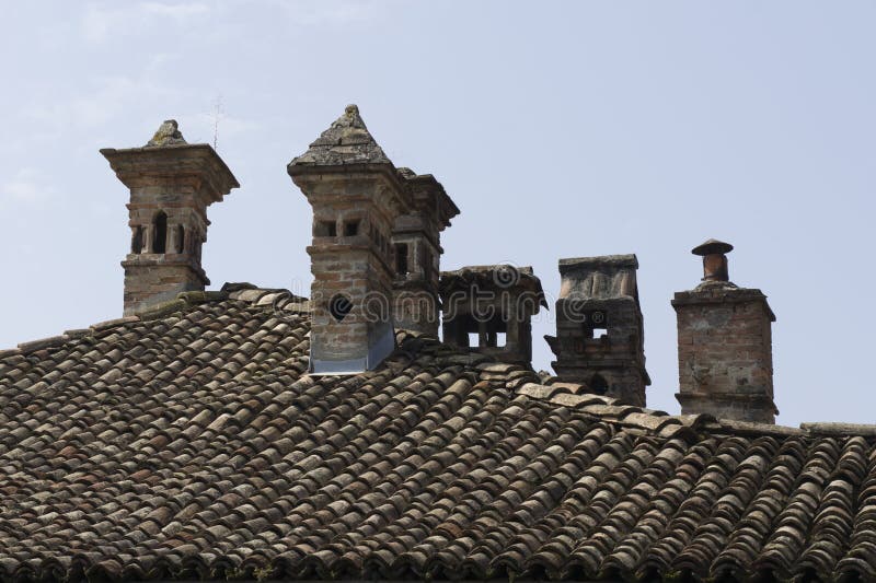 Many chimneys on one roof stock image. Image of pollution - 33270245