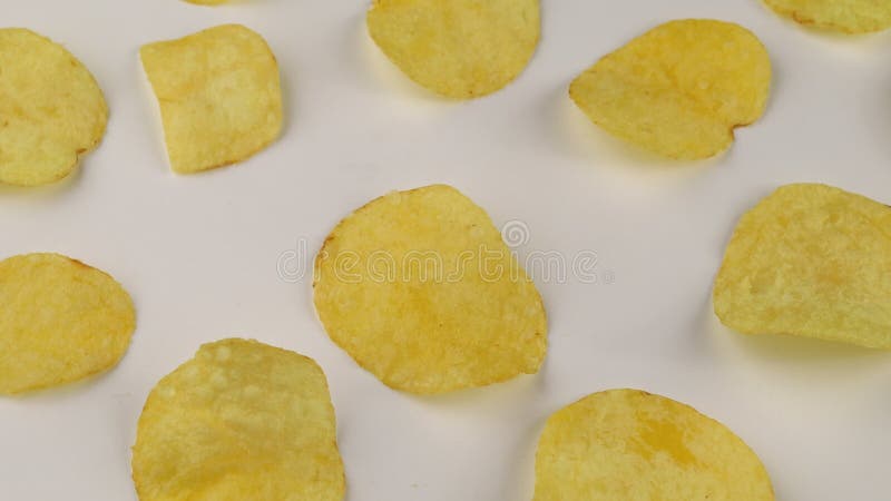 Many Chips on White Isolate. Potato Chips Stock Video - Video of slice ...