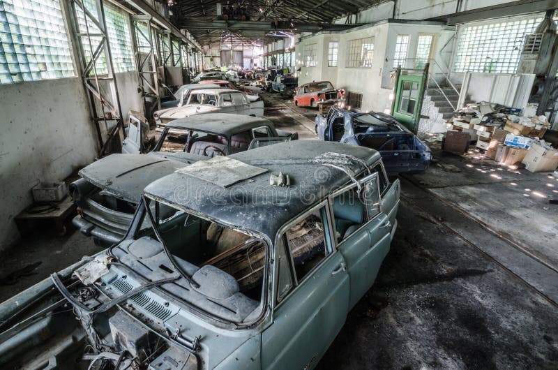 Many Classic Cars in Old Workshop Stock Image - Image of bikes ...