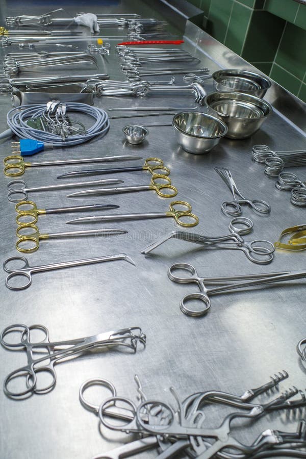 Many Cleaned Instruments for Performing Vascular Surgery Lie on a Metal ...