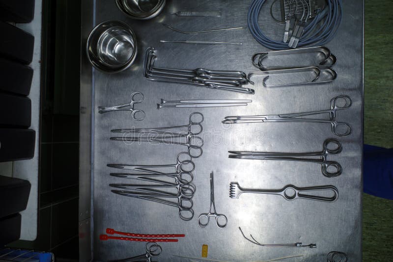 Many Cleaned Instruments for Performing Vascular Surgery Lie on a Metal ...