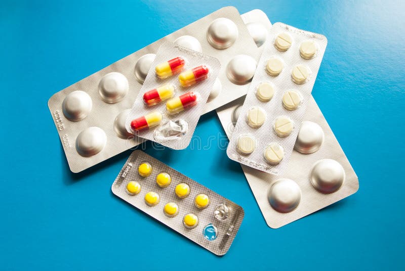 Many Pills In Different Colors Shapes Close-up Stock Photo - Image of ...