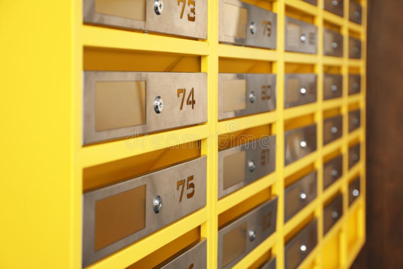 Many Closed Metal Mailboxes with Keyholes and Numbers in Post Office ...