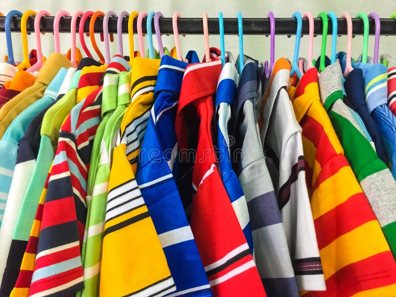 Many clothes hanging stock image. Image of fashion, closet - 289158065
