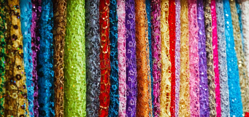 Many Colored Fabrics in the Store Stock Photo - Image of front, closeup ...