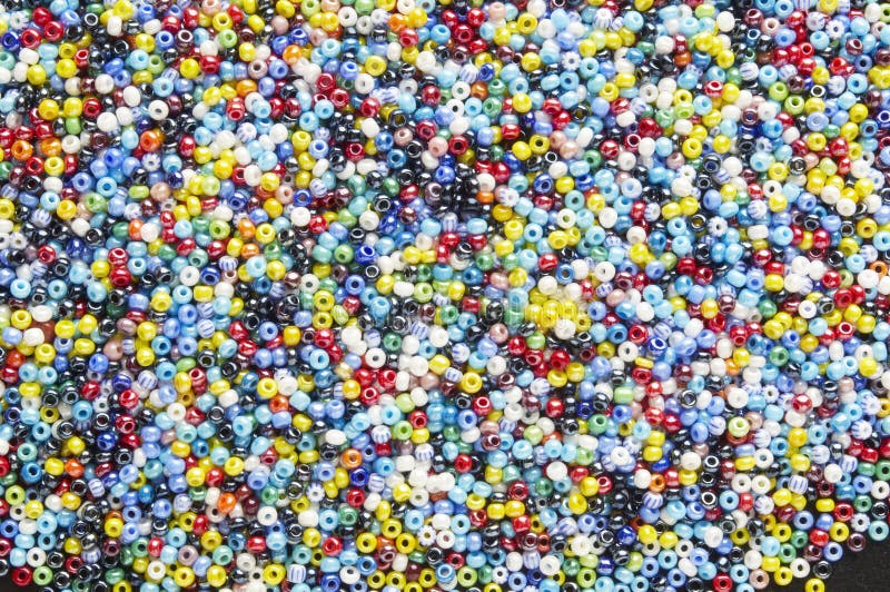 Many-colored mix of beads stock photo. Image of individuality - 23866280