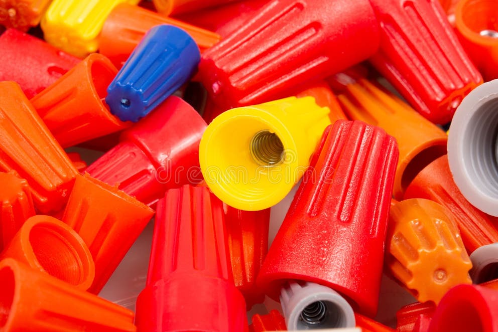 Many Colored Wire Nuts on White Background. Stock Image - Image of ...