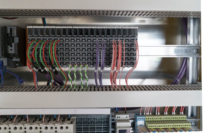 Many Colorful Electrical Wires Lead into a Relay and Transformer Panel ...