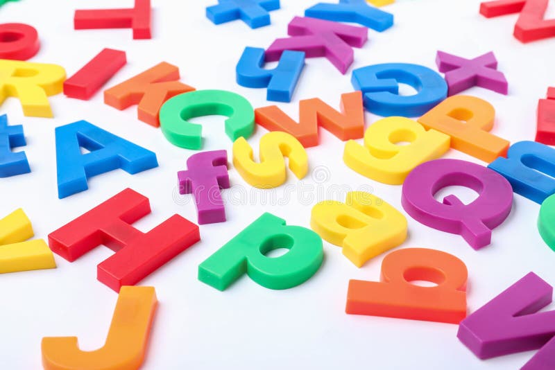 Many Colorful Magnetic Letters on White Background Stock Photo - Image ...