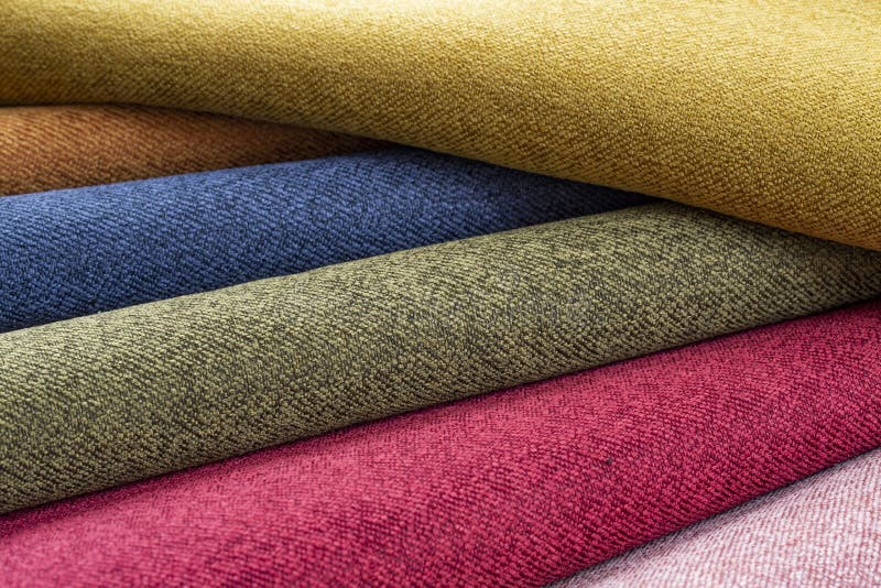 Many Colorful Rolls of Fabric on a Plain Background Stock Image - Image ...