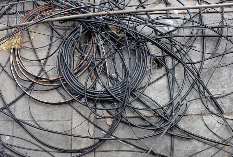Many Confused Electrical Wires on Ground Stock Photo - Image of meshing ...