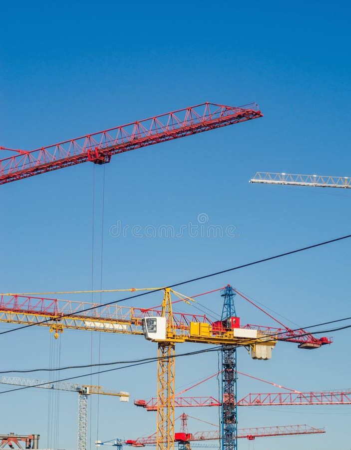 Construction Cranes on Blue Sky Backgrounds Editorial Photography ...