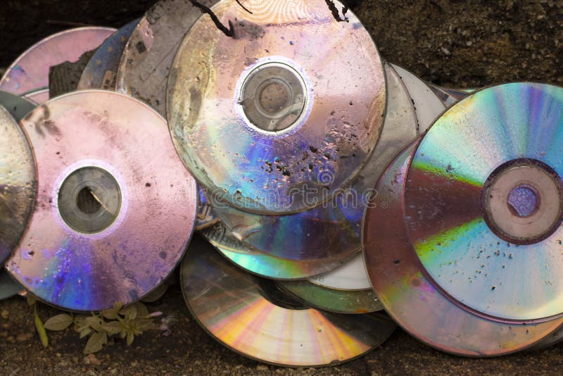 The Many Copies of Trash and Dirty Compact Disc in the Drain Stock ...