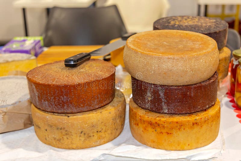 Cheese Wheels Stack stock image. Image of large, size - 267507577