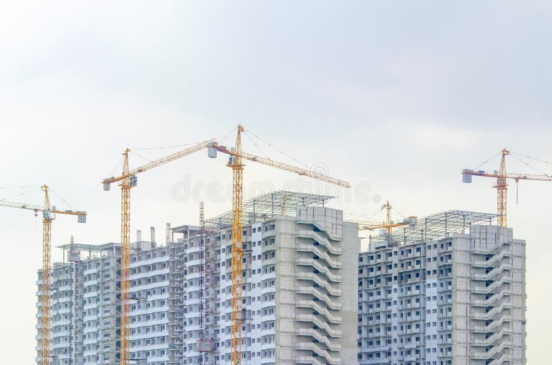 Many Cranes are Building the Building. Stock Photo - Image of joint ...