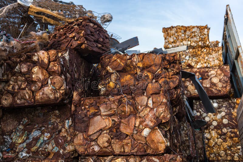 Cubes of Rusty Cans Pressed and Stacked in a Junkyard. Stock Image ...