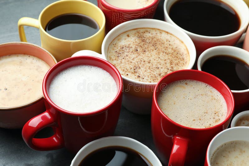 Many Cups of Different Coffees on Grey Table, Closeup Stock Photo ...