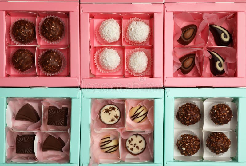 Many Delicious Candies in Boxes, Top View. Production Line Stock Photo ...