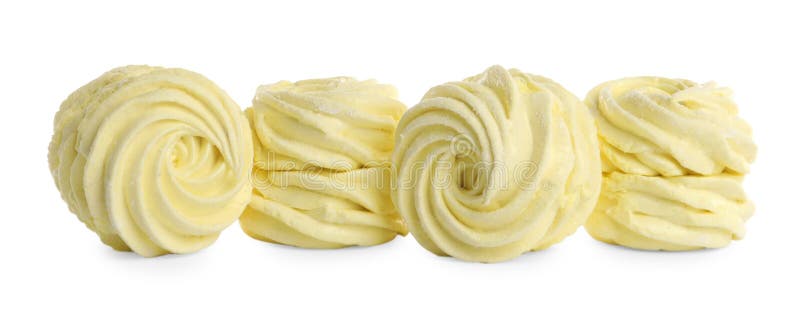 Many Delicious Yellow Zephyrs on White Background Stock Photo - Image ...