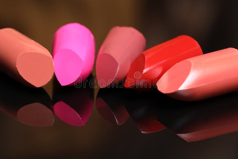 Many Different Bright Lipsticks on Mirror, Closeup Stock Image - Image ...
