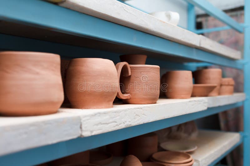 Many Different Ceramic Items on Store Shelves Stock Photo - Image of ...