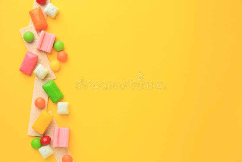 Many Different Chewing Gums on Yellow Background, Flat Lay. Space for ...