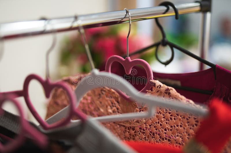 Many Different Colored Women S Clothes on Hangers in a Store Stock ...