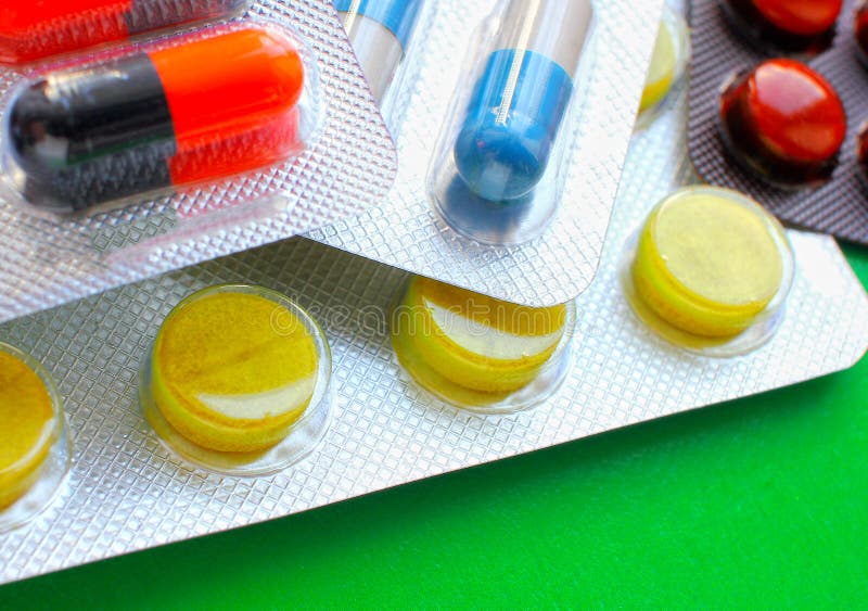 Many Different Colorful Tablets in Strips. Medications. Stock Photo ...