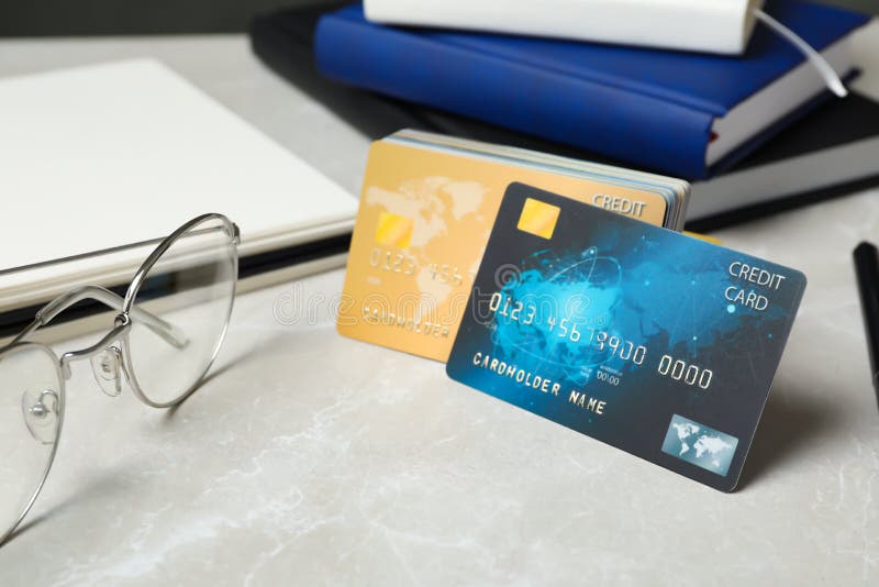 Many Different Credit Cards on Light Grey Marble Table Stock Image ...