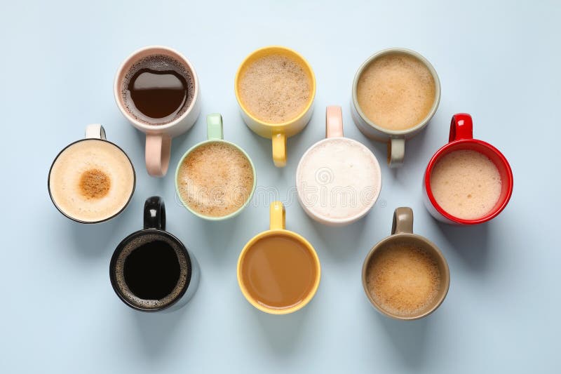 Many Different Cups with Aromatic Coffee on Light Blue Table, Flat Lay ...