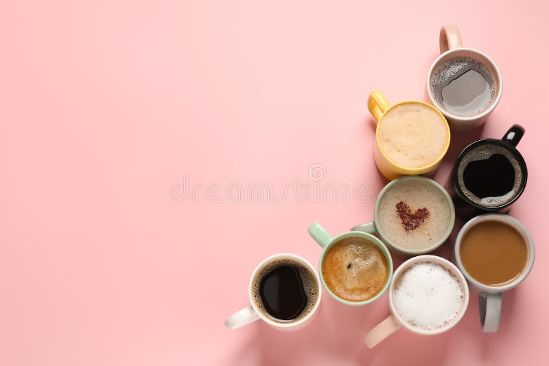 Many Different Cups with Aromatic Coffee on Pink Table, Flat Lay. Space ...