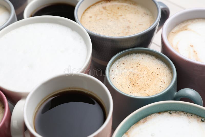 Many Different Cups with Aromatic Hot Coffee on Table, Closeup Stock ...