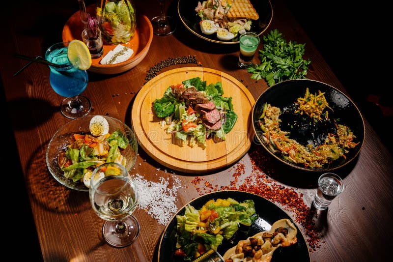 Many Different Delicious Dishes on the Table. Various Snacks and ...