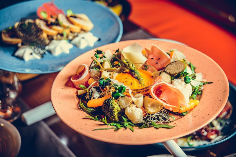 Many Different Dishes in Restaurant, White Plate on the Table with Side ...