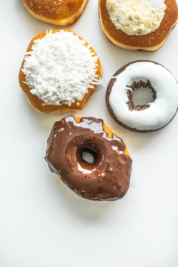 Many Different Donuts on a White Background Top Down View Stock Photo ...