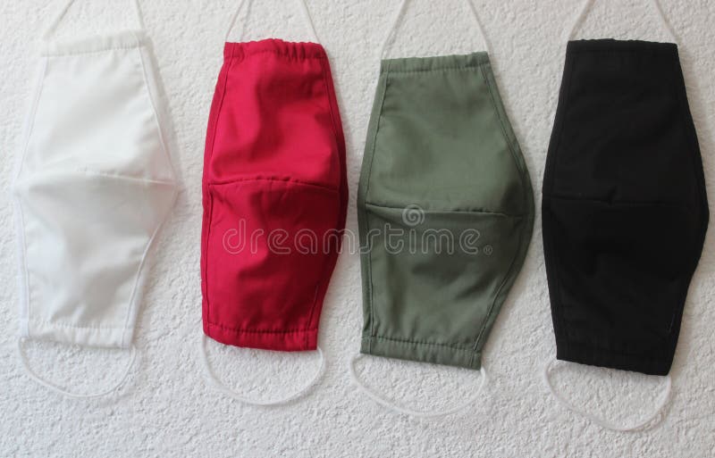 Many Different Face Masks on the Wall Stock Image - Image of mask, face ...