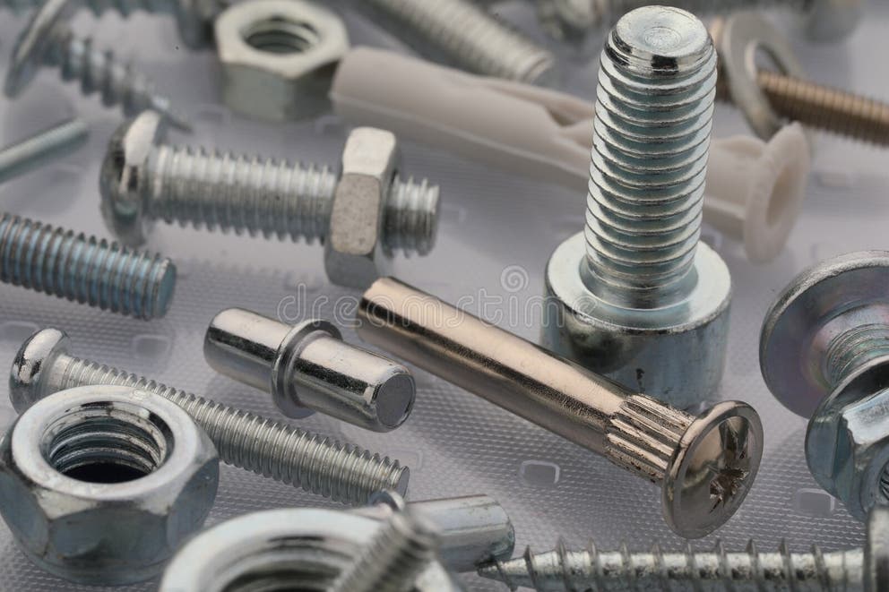 Many Different Fasteners on Plastic Surface, Closeup Stock Photo ...