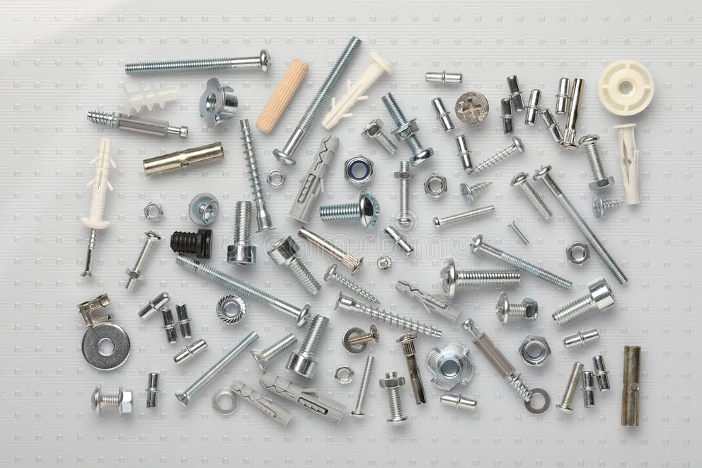 Many Different Fasteners on Plastic Surface, Flat Lay Stock Photo ...