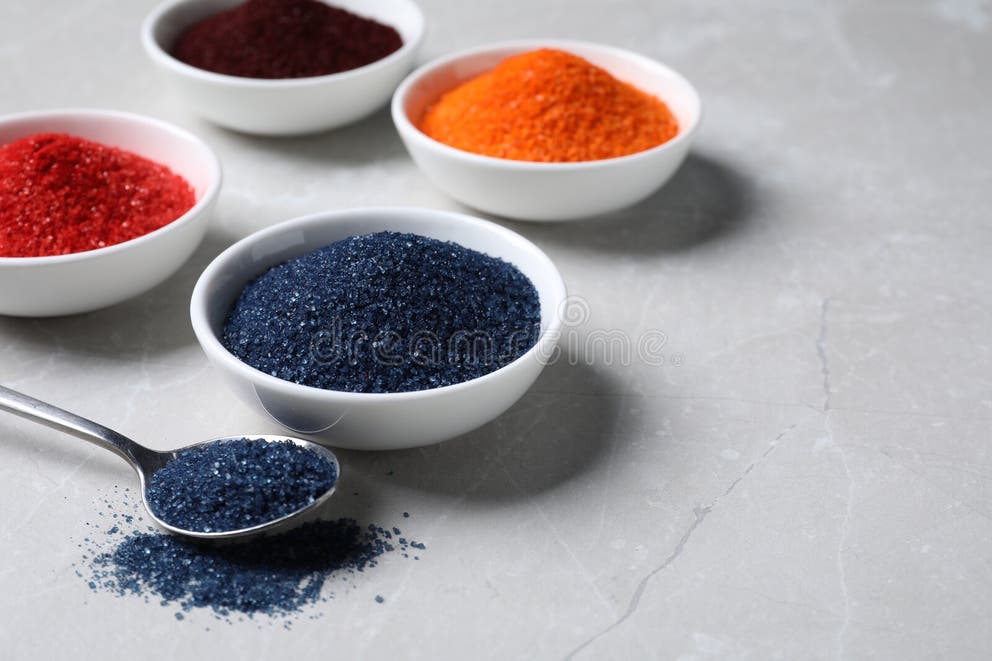 Many Different Food Coloring on Light Grey Table. Space for Text Stock ...