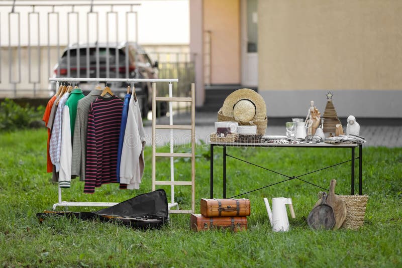 Many Different Items Selling in Yard. Garage Sale Stock Image - Image ...