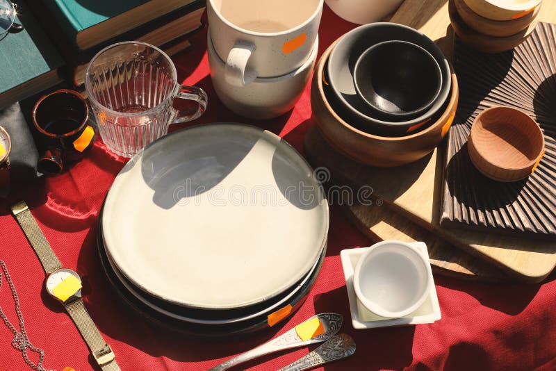 Many Different Items on Table Outdoors, Above View. Garage Sale Stock ...