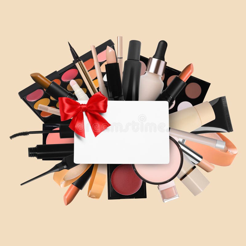 Many Different Makeup Products and Empty Gift Card on Beige Background ...