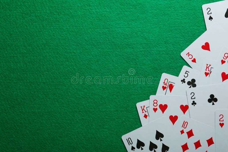 Many Different Playing Cards on Green Table, Flat Lay. Space for Text ...