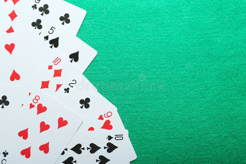 Many Different Playing Cards on Green Table, Flat Lay. Space for Text ...